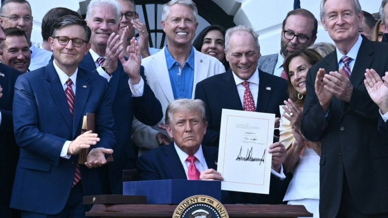Trump signs controversial tax law at ceremony on independence day